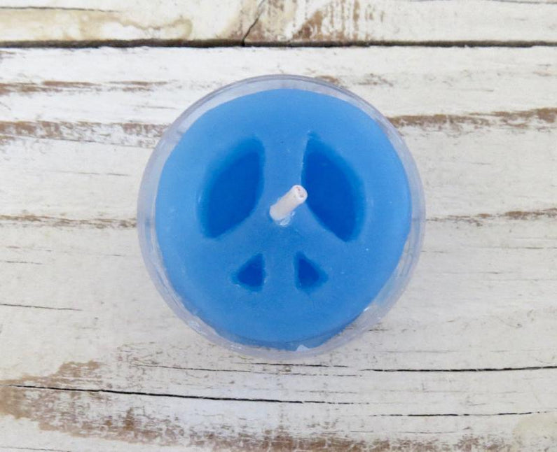 Light blue peace sign candle – The Flower Child